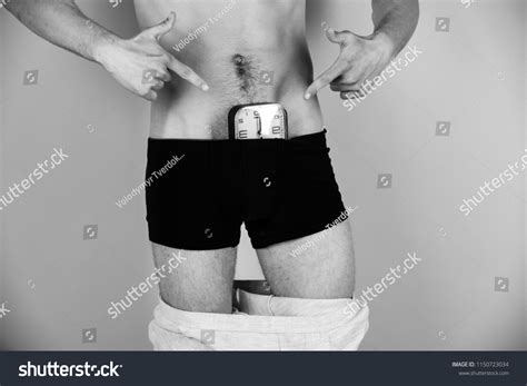 Man Pointing Alarm Clock Hand Black Stock Photo 1150723034 Shutterstock