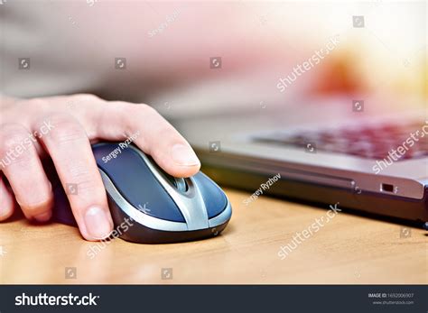 Female Hand Touching Computer Mouse Closeup Stock Photo 1692006907 Shutterstock