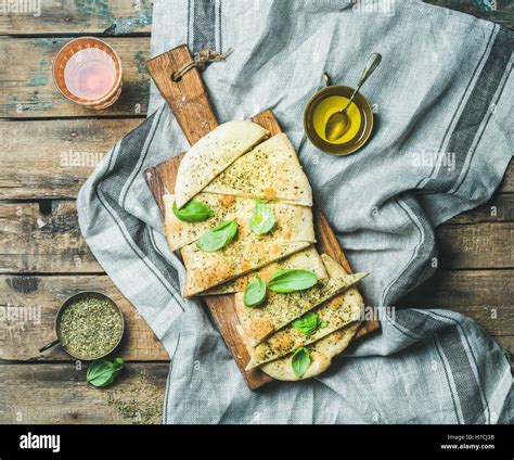Homemade Focaccia Flatbread With Basil Olive Oil And Rose Wine Stock