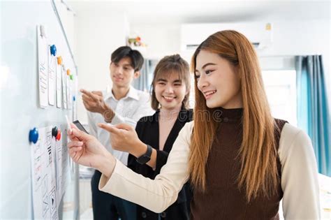 Creative Ux Ui Team Brainstorming For Startup Business Development In Modern Office Environment