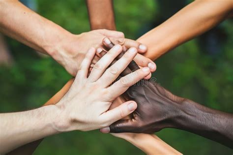 Diverse Hands Joined Together In Unity And Support Symbolizing