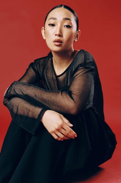 Premium Photo Fashion Asian Woman In Sheer Top And Black Pants