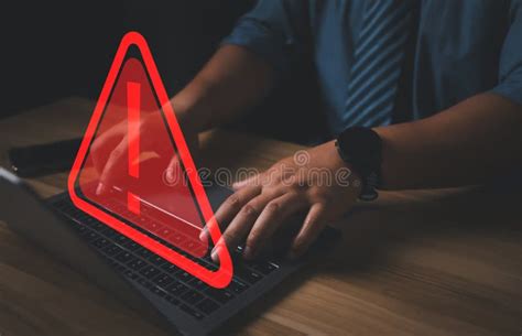 Hacker Or Programmer Using Laptop With Triangle Caution Warning Sign Coding Cryptography