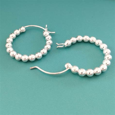 Сребърни обеци халки топчета Di Trend Сребърни обеци халки