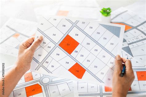 Woman Holding A Cadastral Map Looking At Lots Of Lands Land Plot Management Real Estate