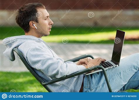 Thoughtful Programmer Brainstorming Ideas About Coding Stock Photo
