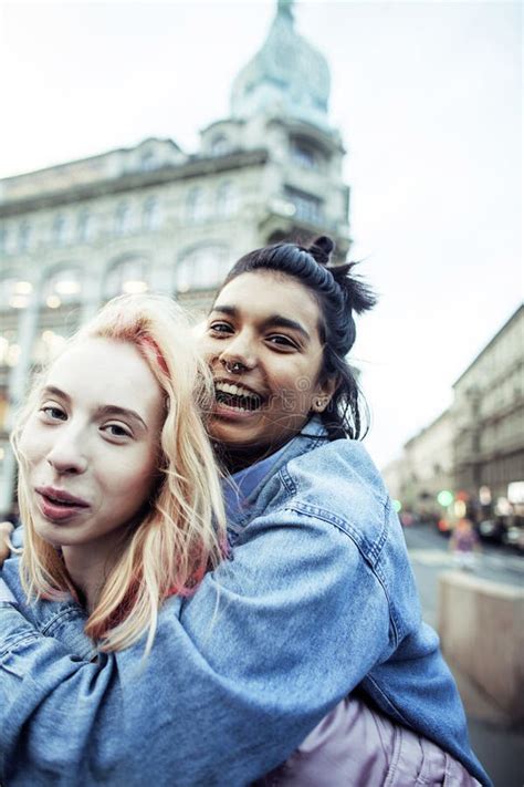 Cute Young Couple Of Teenagers Girlfriends Having Fun Traveling Stock