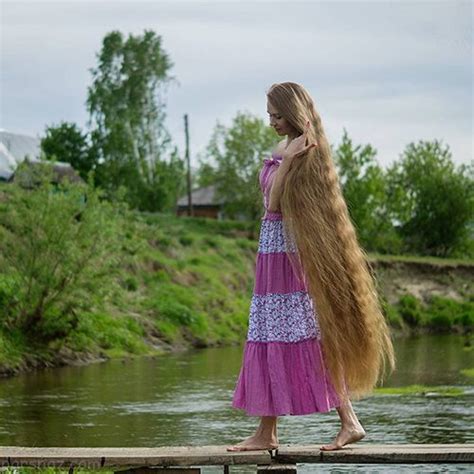 عکس های جالب و دیدنی از مو بلندترین دختر زیبای جهان در کشور روسیه