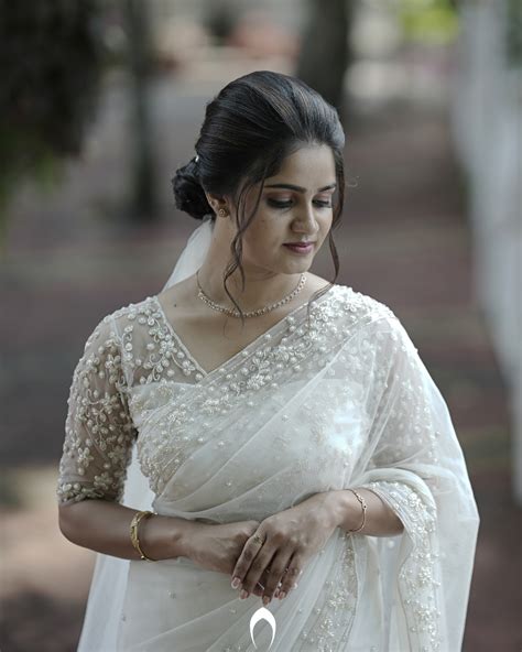 Bride Aemy Wearing Our Signature Bridal Hand Embroidered Saree In Off