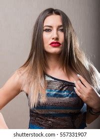 Sensual Woman Pulling Her Top On Stock Photo Shutterstock