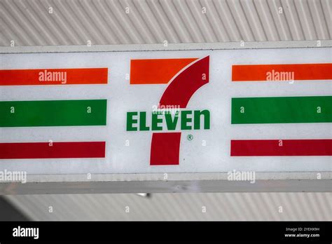 The 7 Eleven Store Sign Featuring The Iconic Orange Green And Red