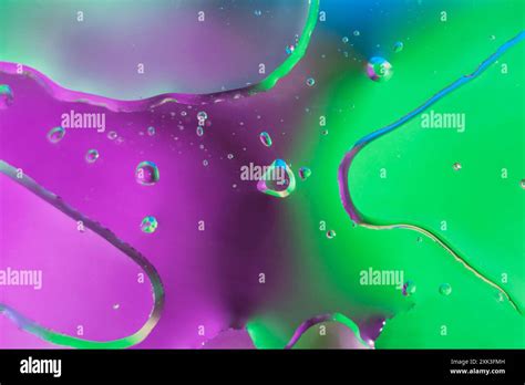 Vibrant Abstract Art With Liquid Droplets And Colorful Blobs On Glass