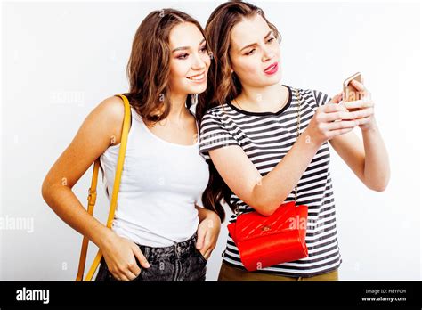 Two Best Friends Teenage Girls Together Having Fun Posing Emotional On White Background