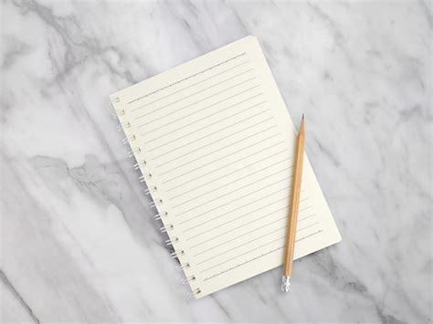 Premium Photo Notebook With Pencil On Marble Texture Background