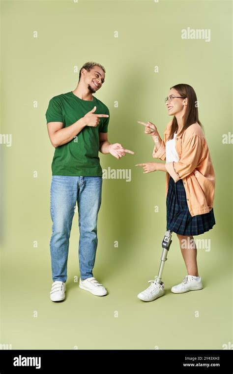 A Non Binary Person Happily Engages With Their Friend Showcasing