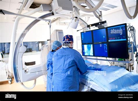 Aneurysm Surgery Surgical Team Removing An Aneurysm In A Patients