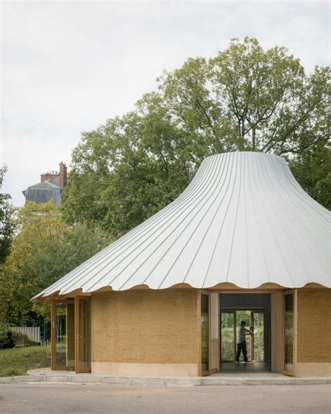 L Atelier Senzu Builds Carousel Inspired Rammed Earth Pavilion For