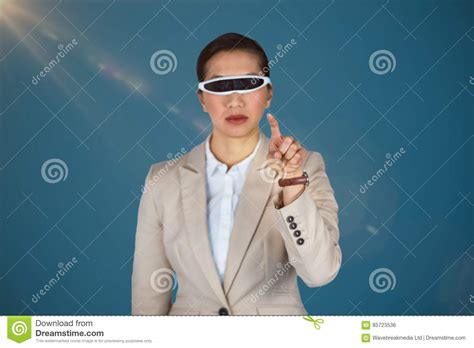 Composite Image Of Confidence Businesswoman Using Virtual Video Glasses