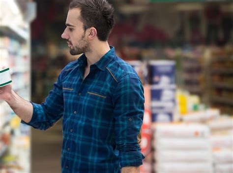 Premium Photo Handsome Young Man Shopping For Fruits And Vegetables