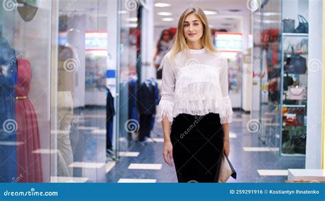 Girl Tall Beautiful Blond Woman Walking Down The Hall Of Shopping