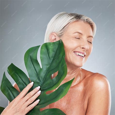 Premium Photo Beauty Skin And Mature Woman With Plant For Organic