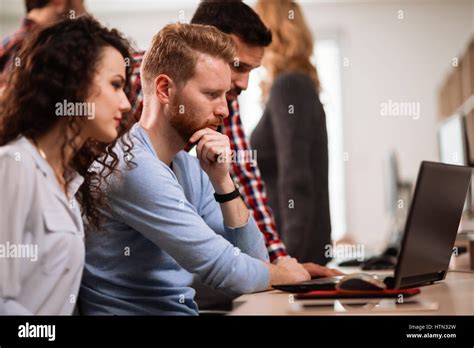 Programmers Cooperating At IT Company Developing Apps Stock Photo Alamy
