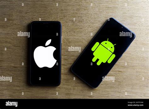 Apple And Android Smartphones Iphone IOS Versus Android Operating System Stock Photo Alamy