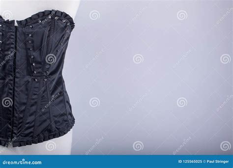 Tailors Mannequin Dressed In A Black Corset With Spikes Stock Image