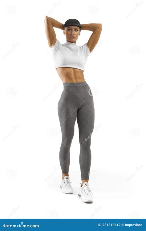 Portrait Of Young Sporty Happy Woman With Perfect Body Abs Two Arms Behind The Head Stock