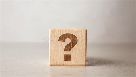 wooden block with question mark faq and qa problem solution wood