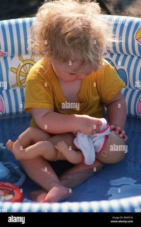 Little girl doll Stock Photo - Alamy