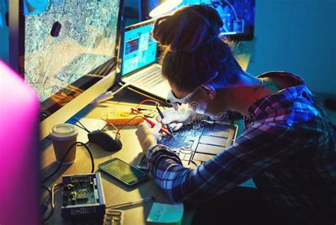 Woman Electronics Technician And Motherboard With Soldering Iron For Microchip Repair