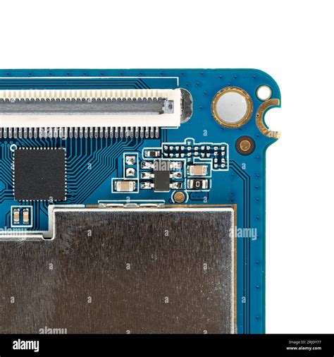 Electronic Components Of A Microcircuit And Other Details On A Blue Electronic Circuit Board