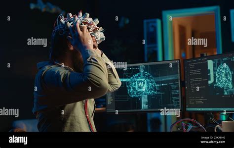 Man Puts Eeg Headset On To Transfer Mind Into Computer Virtual World Becoming One With Ai