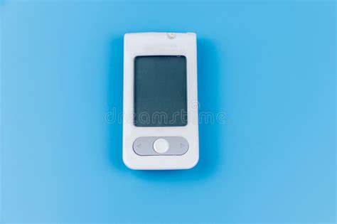 Digital Glucometer On Pastel Blue Background Diabetes Concept Stock Image Image Of Exam