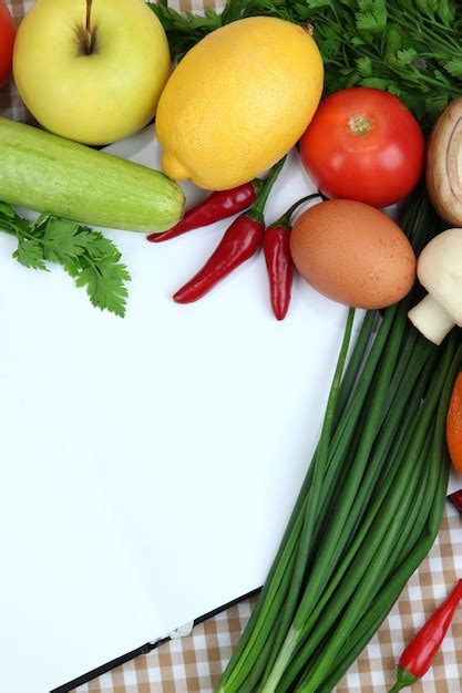 Premium Photo Cooking Concept Groceries With Empty Cookbook Close Up Premium Photo Cooking Concept Groceries With Empty Cookbook Close Up