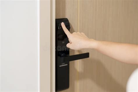 Hand Using Fingerprint Scan For Smart Digital Door Lock While Open Or Close The Door At Home Or