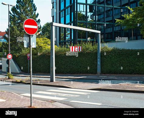 Road Leading Into The Tunnel With A Warning Sign And A Marking That Can
