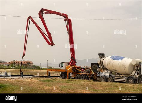 Concrete Pump At Construction Site Concrete Pouring With Pump Construction Of A Building With