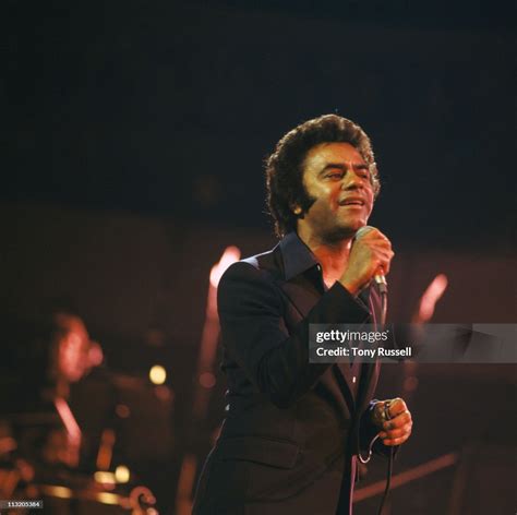 Johnny Mathis Us Singer Singing Into A Microphone During A Live