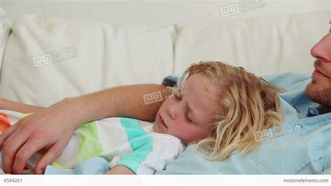 Father And Son Sleeping Together Stock Video Footage