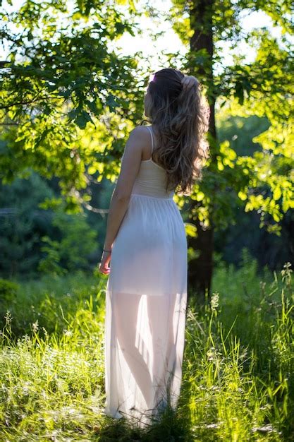 Premium Photo Beautiful Young Russian Girl Dressed In A White Dress