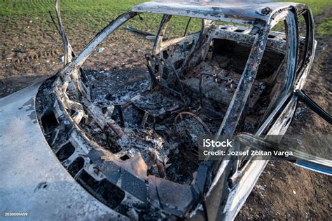 A Burned Out Car Burnt Car In The Field Car Fire Vehicle Fire Due To