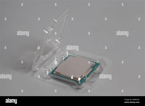 Central Processing Unit CPU Processor Microchip In Plastic Packaging Stock Photo Alamy