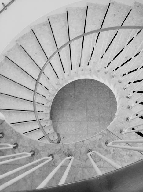 Premium Photo High Angle View Of Spiral Staircase In Building