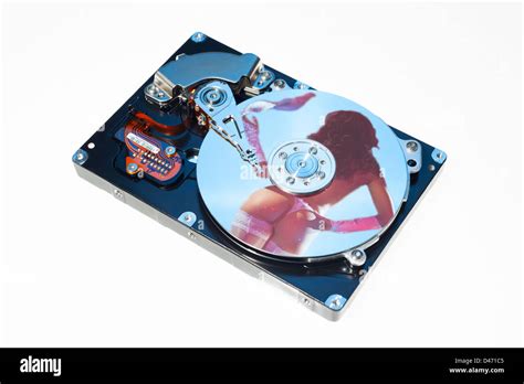 Computer Hard Disk Drive Containing Picture Of Nude Woman On White M Stock Photo Alamy