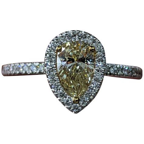 14 Karat Yellow Gold Delicate Rustic Icey Pear Diamond Ring Center 1