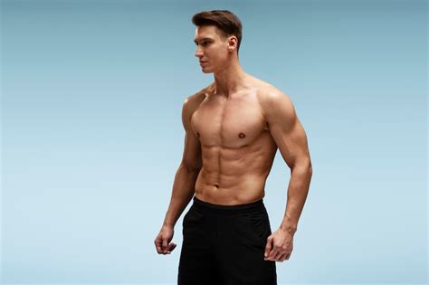 Premium Photo Strong Athletic Man Fitness Model Posing With Naked