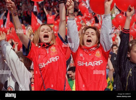 Manchester United Girls Fans Cheer On Their Team Hi Res Stock