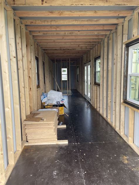 Container House With Wooden Walls And Floor Boards Diy Hallway